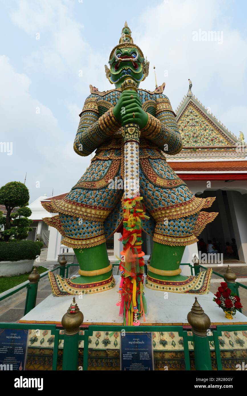 The sculptures of two mythical giant demons, Thotsakan and Sahatsadecha ...