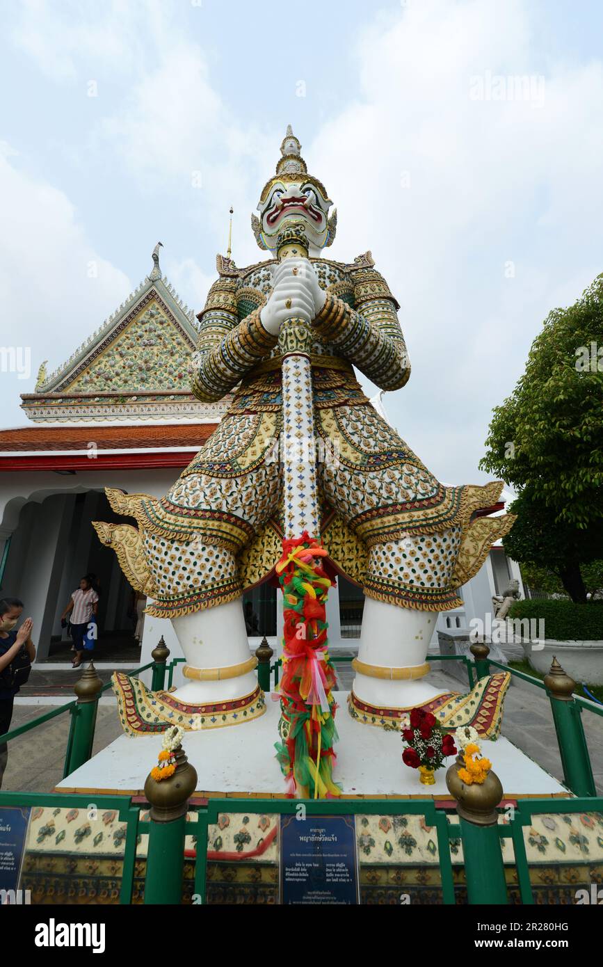 The sculptures of two mythical giant demons, Thotsakan and Sahatsadecha ...