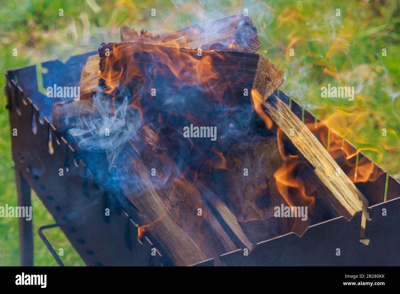 This is small folding portable brazier that can be used in BBQ grill to ...