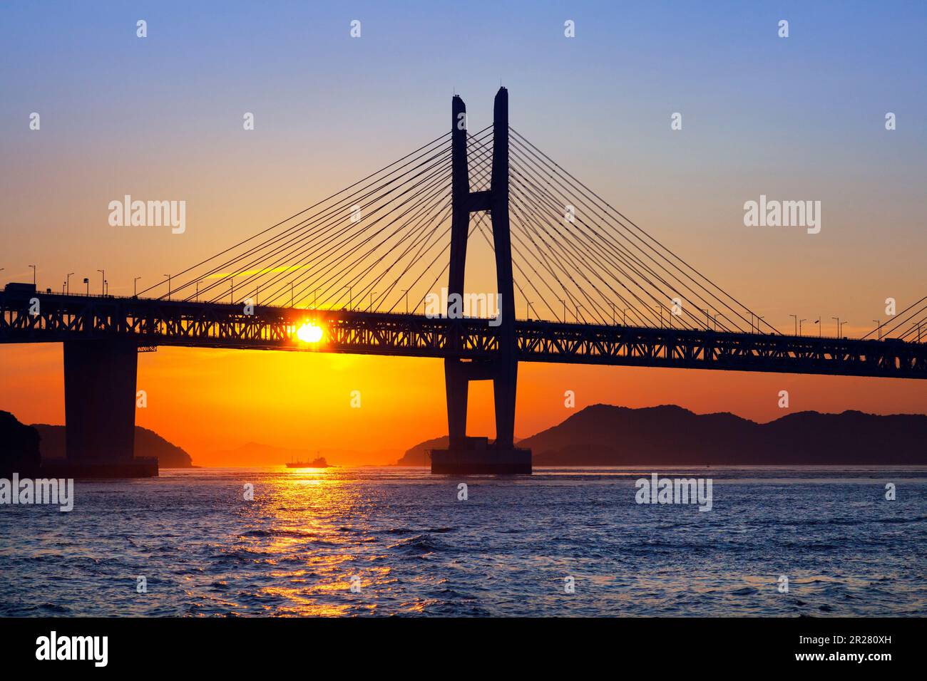 Seto-Ohashi bridge and the sunset, Iwakurojima Bridge Stock Photo - Alamy