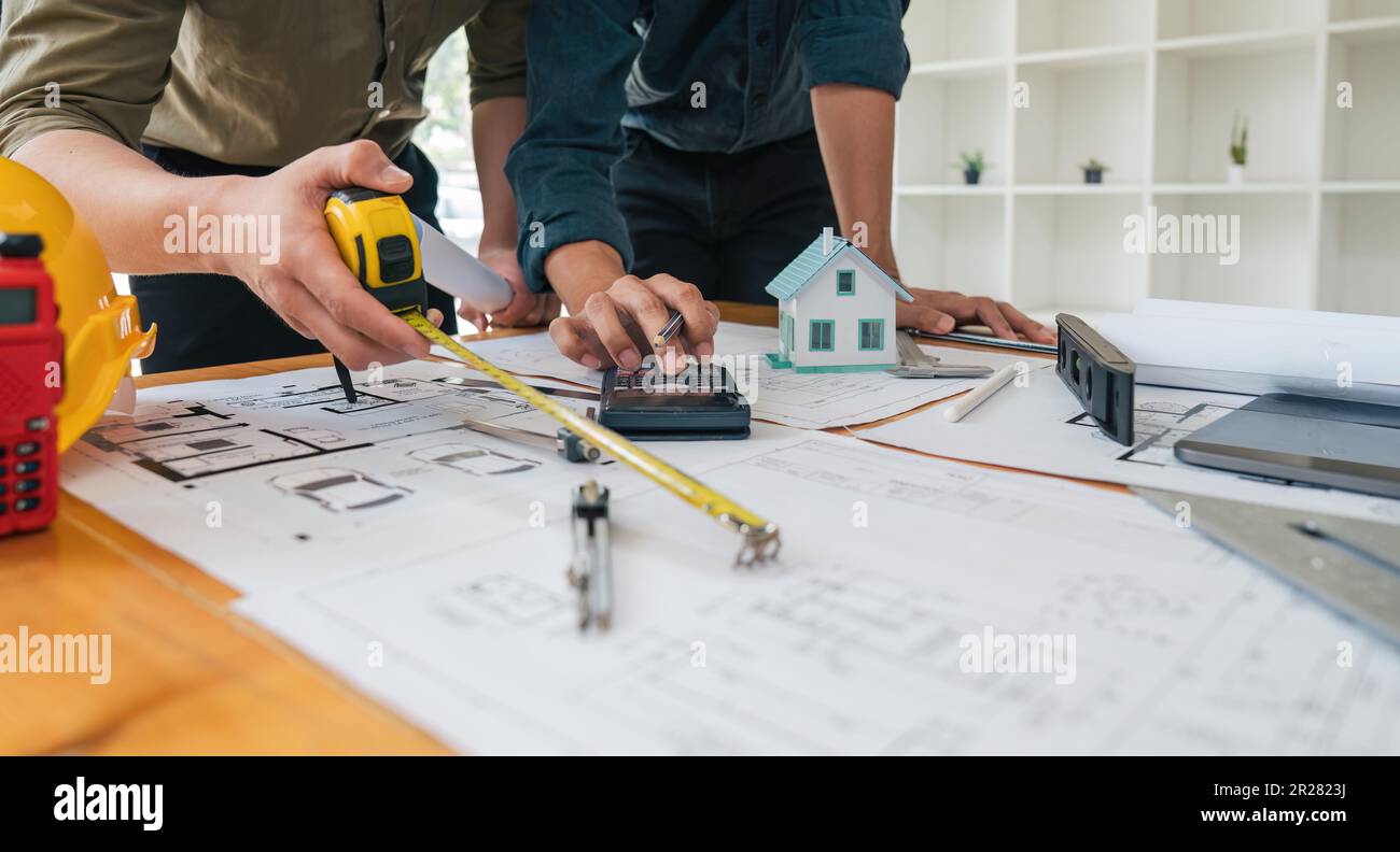 Engineer Working In Office With Blueprints Inspection In Workplace For