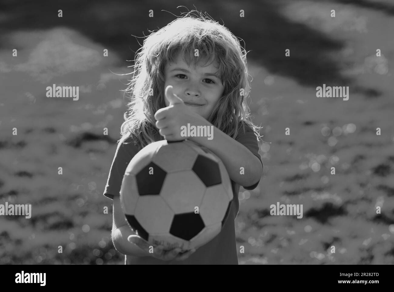 Kid playing soccer, happy child enjoying sports football game, kids ...