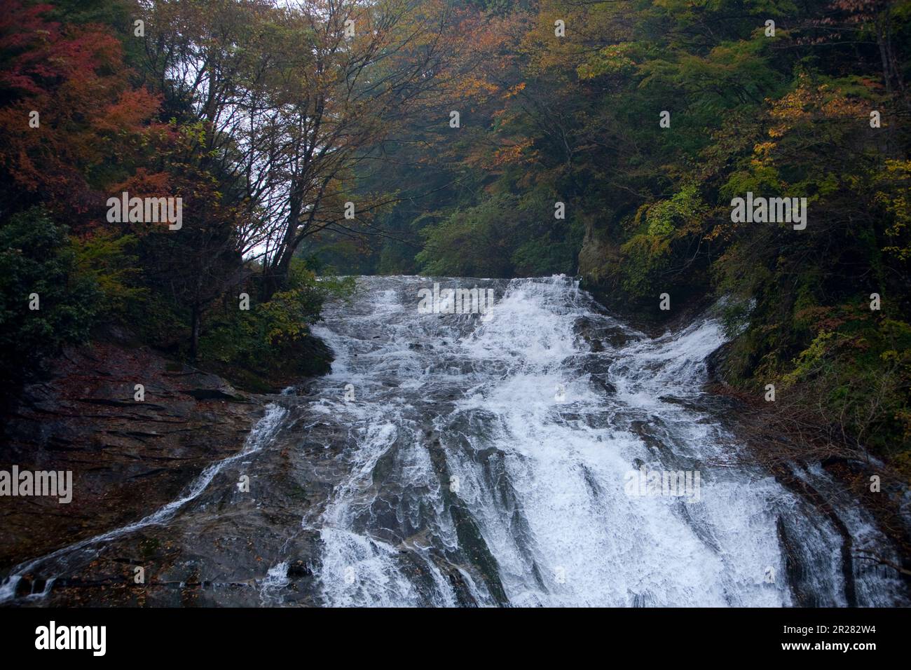 Yoro ravine turning red and Awamata waterfall Stock Photo - Alamy