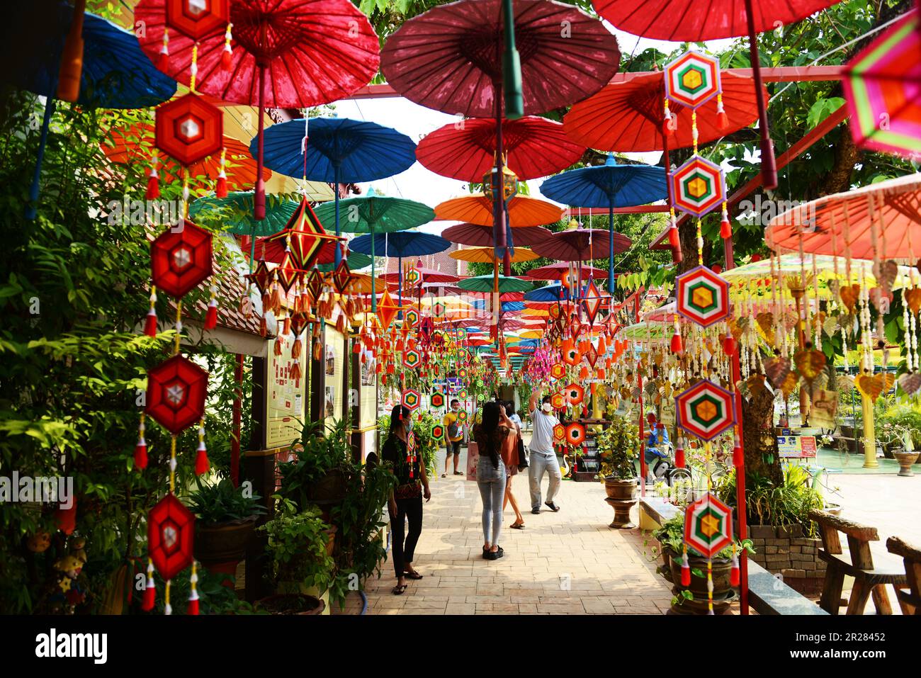 Colorful decorative umbrellas in Wat Sao Thong Thong Buddhist temple in ...