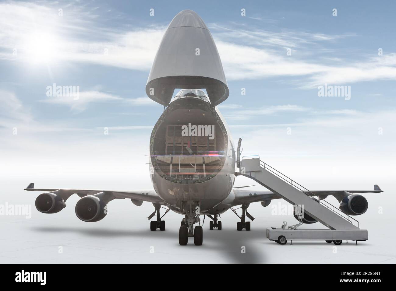 Front view of the white wide body cargo aircraft with an open nose ...