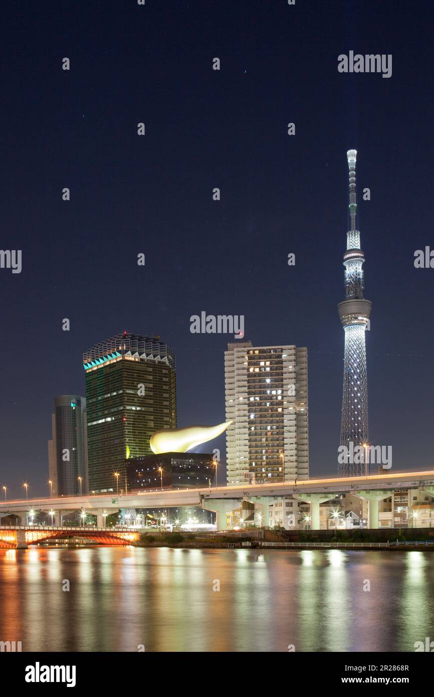 A night view of the light up of the sky tree towers and the skyscrapers ...