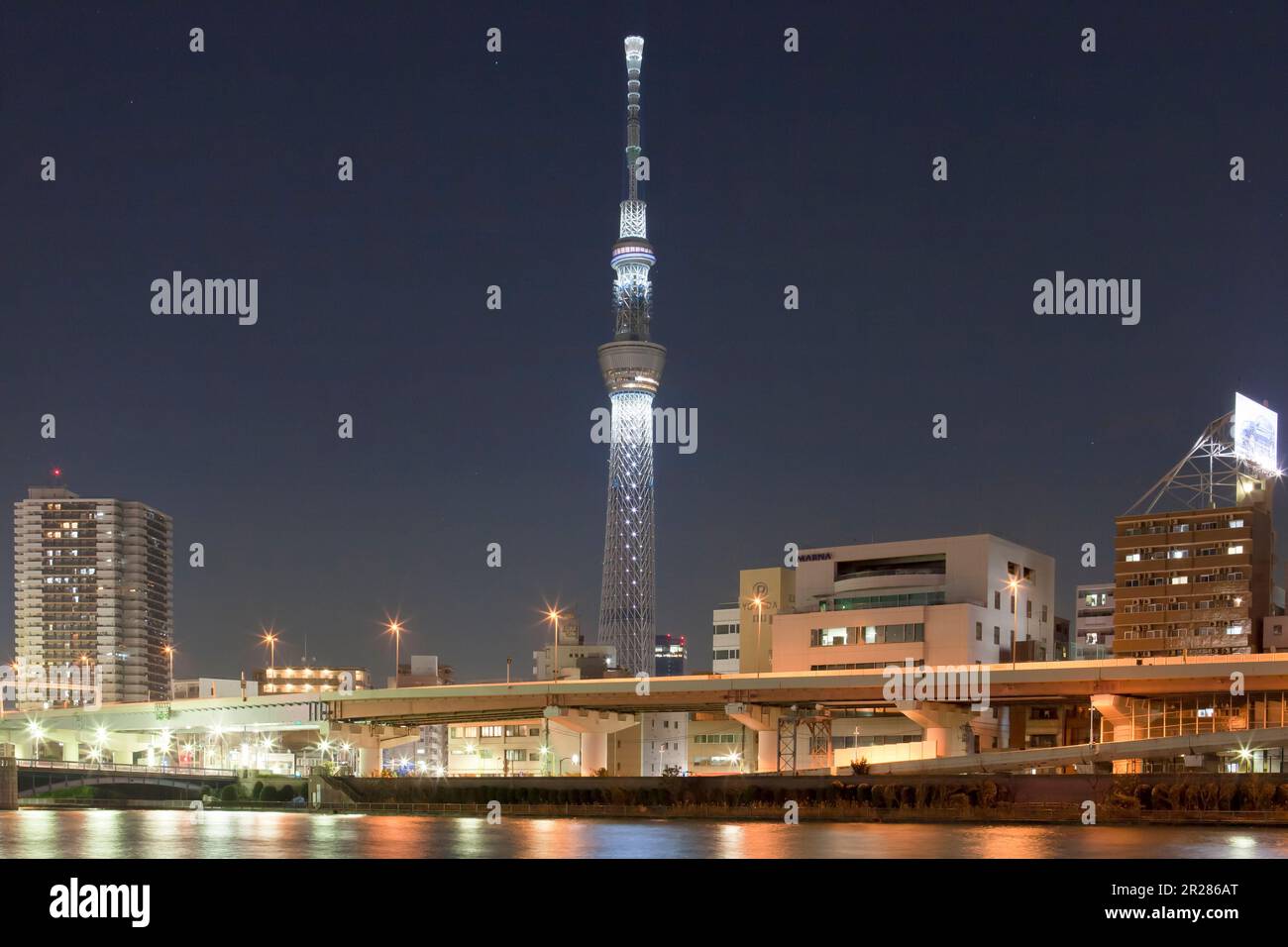 A night view of the light up of the sky tree towers and the skyscrapers ...