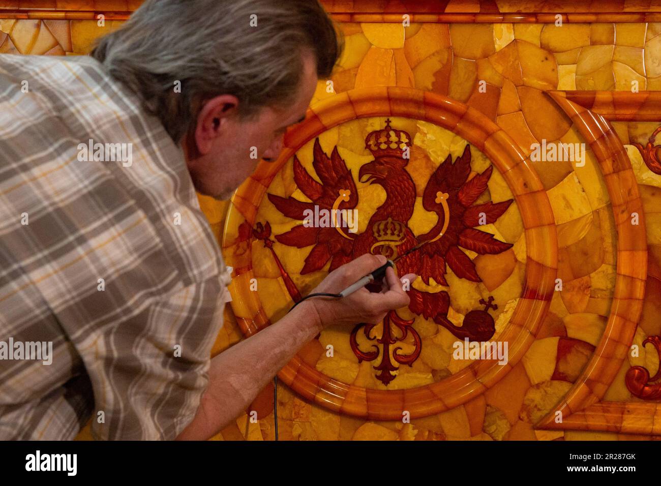 St. Petersburg, Russia. 16th May, 2023. A craftsman demonstrates the ...