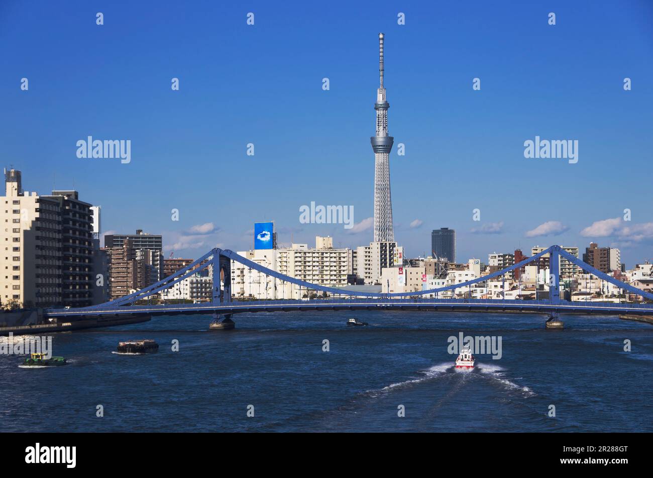 Tokyo sky tree in the blue sky, Kiyosubashi bridge, Sumidagawa river ...