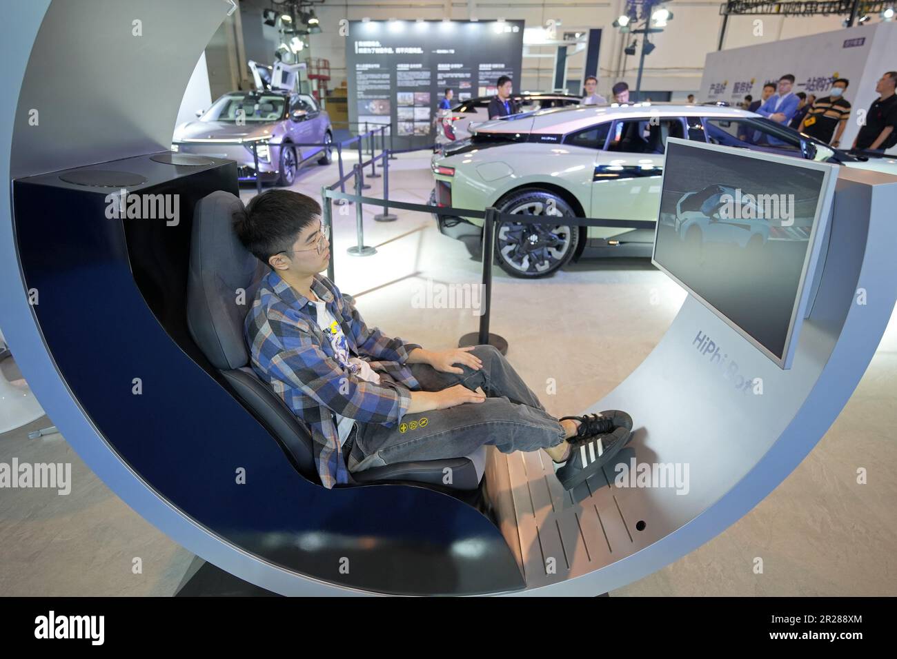 QINGDAO, CHINA - MAY 17, 2023 - Visitors experience an in-car ...