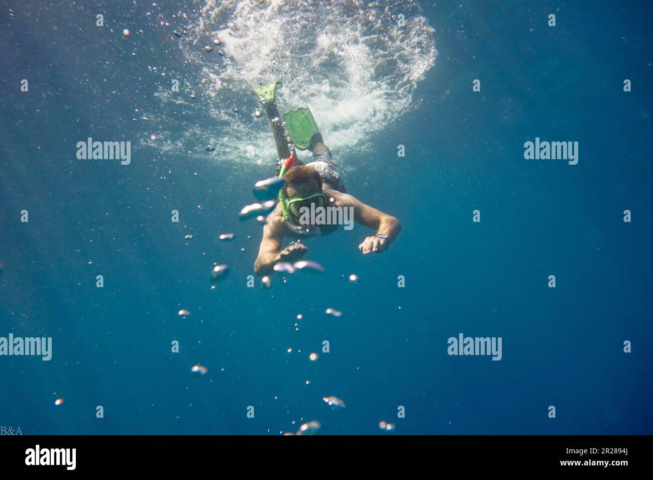 Snorkeling and diving person in the mediterranean sea Stock Photo - Alamy