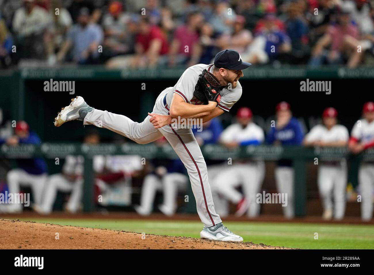 Atlanta Braves relief pitcher Dylan Lee follows through on his delivery ...