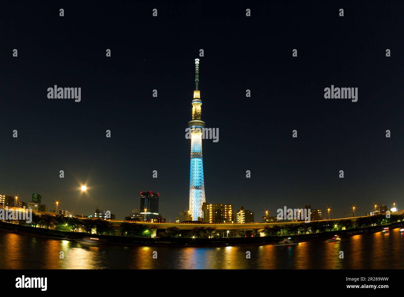 Tokyo sky tree lights up and full moon Stock Photo - Alamy