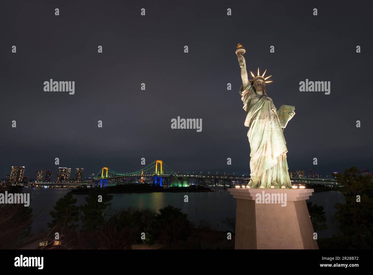 The statue of liberty and Rainbow Bridge Stock Photo - Alamy