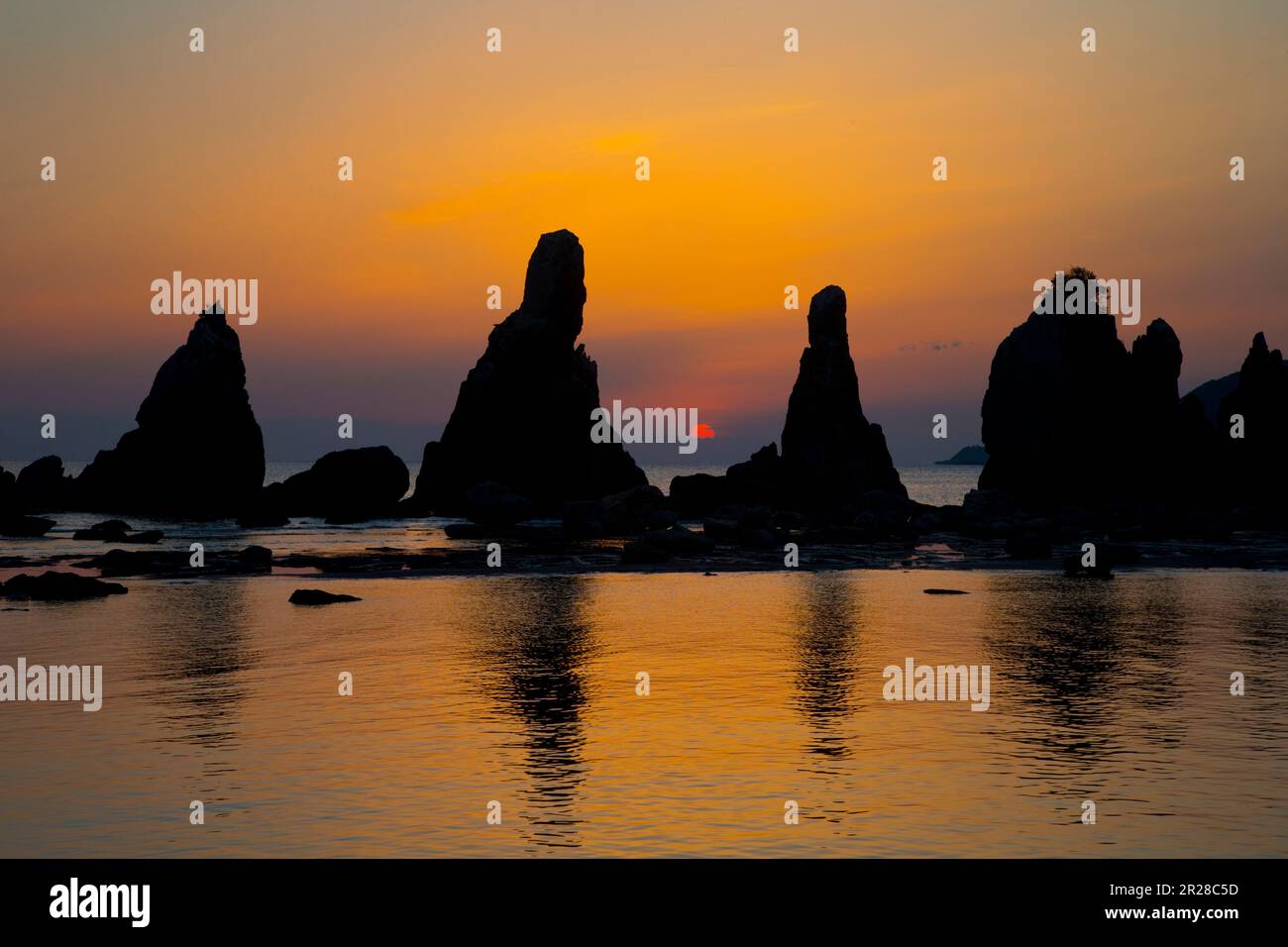 Hashigui rocks and the morning sun Stock Photo - Alamy