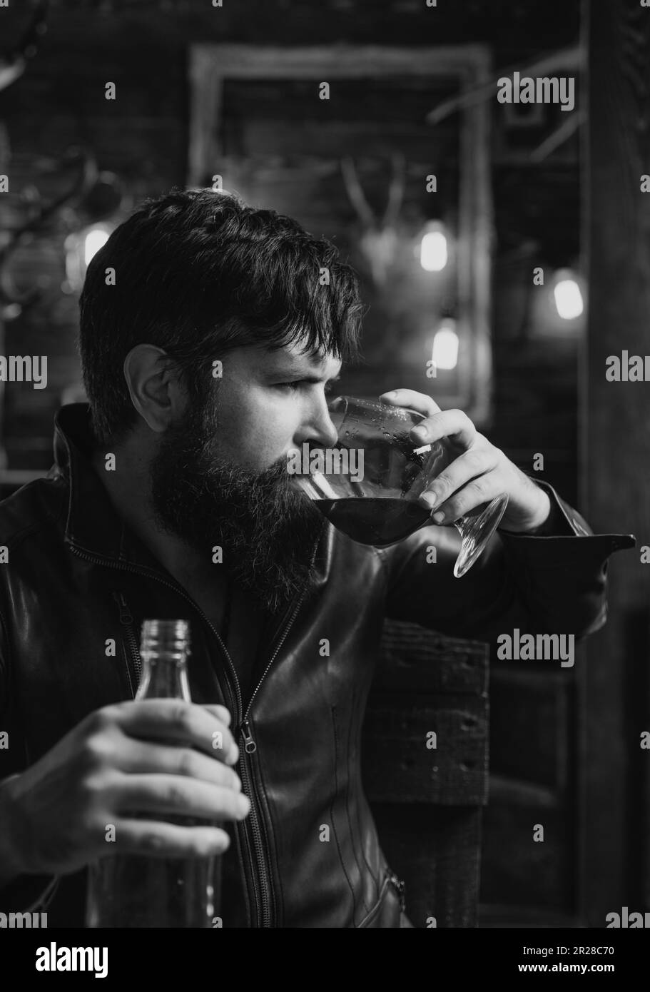 Drunk men hipster drinking alcohol feeling lonely and desperate in ...