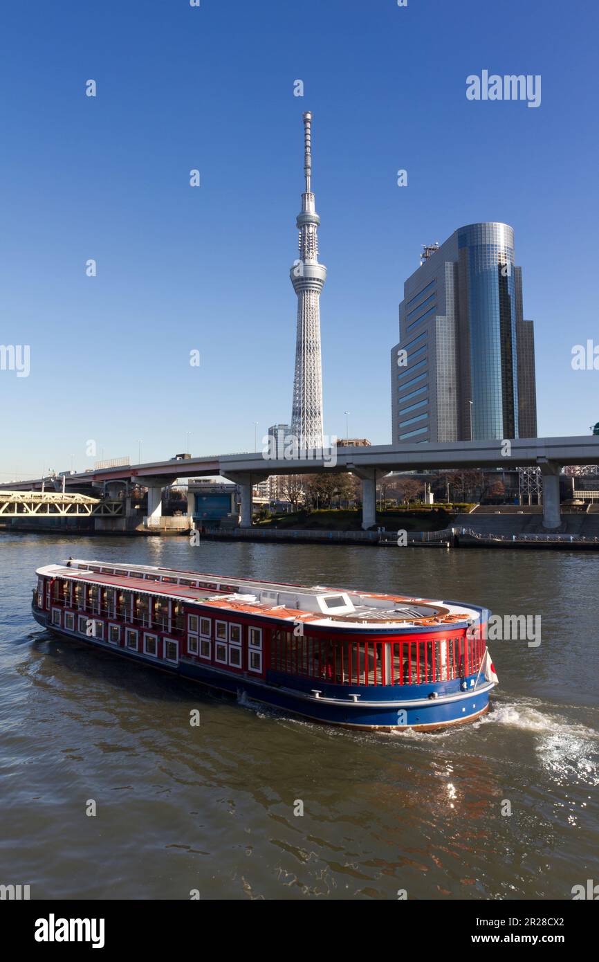 Skytree, a water bus and Sumida River Stock Photo - Alamy