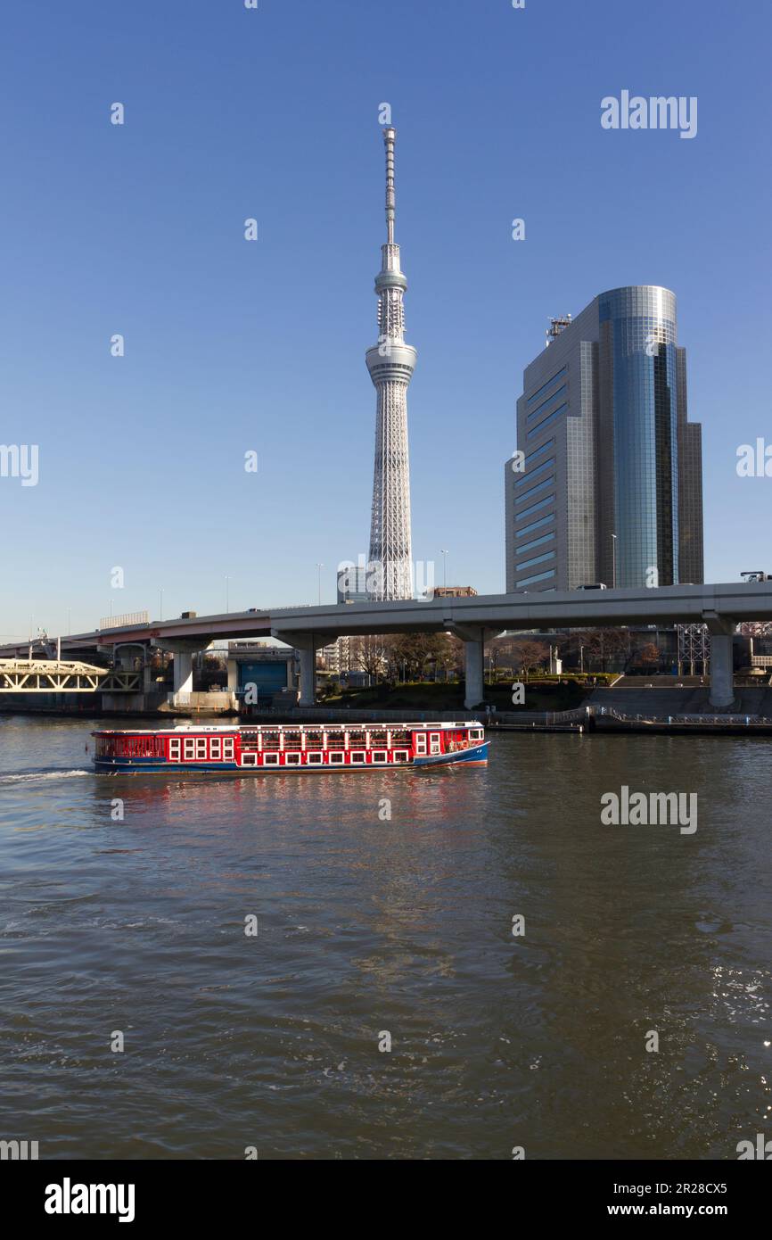 Skytree, a water bus and Sumida River Stock Photo - Alamy