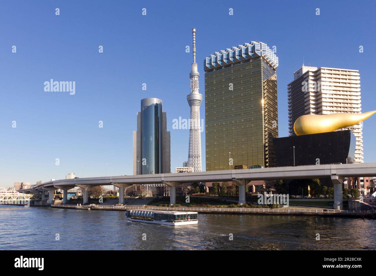 Skytree, a water bus and Sumida River Stock Photo - Alamy