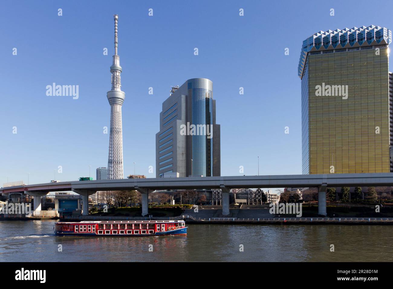 Skytree, a water bus and Sumida River Stock Photo - Alamy