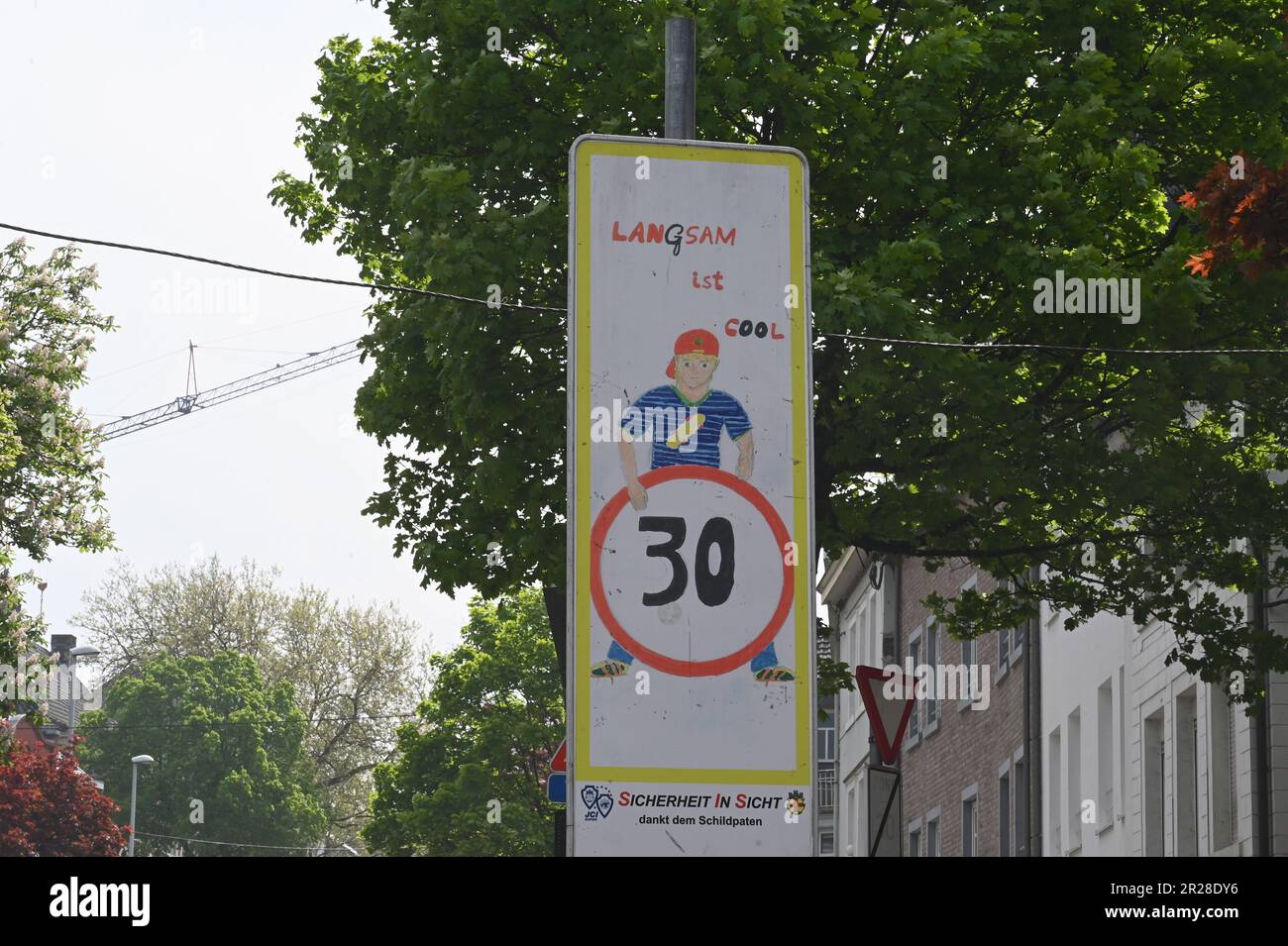 Eupen, Belgium. 14th May, 2023. Sign with the inscription Slow is cool ...
