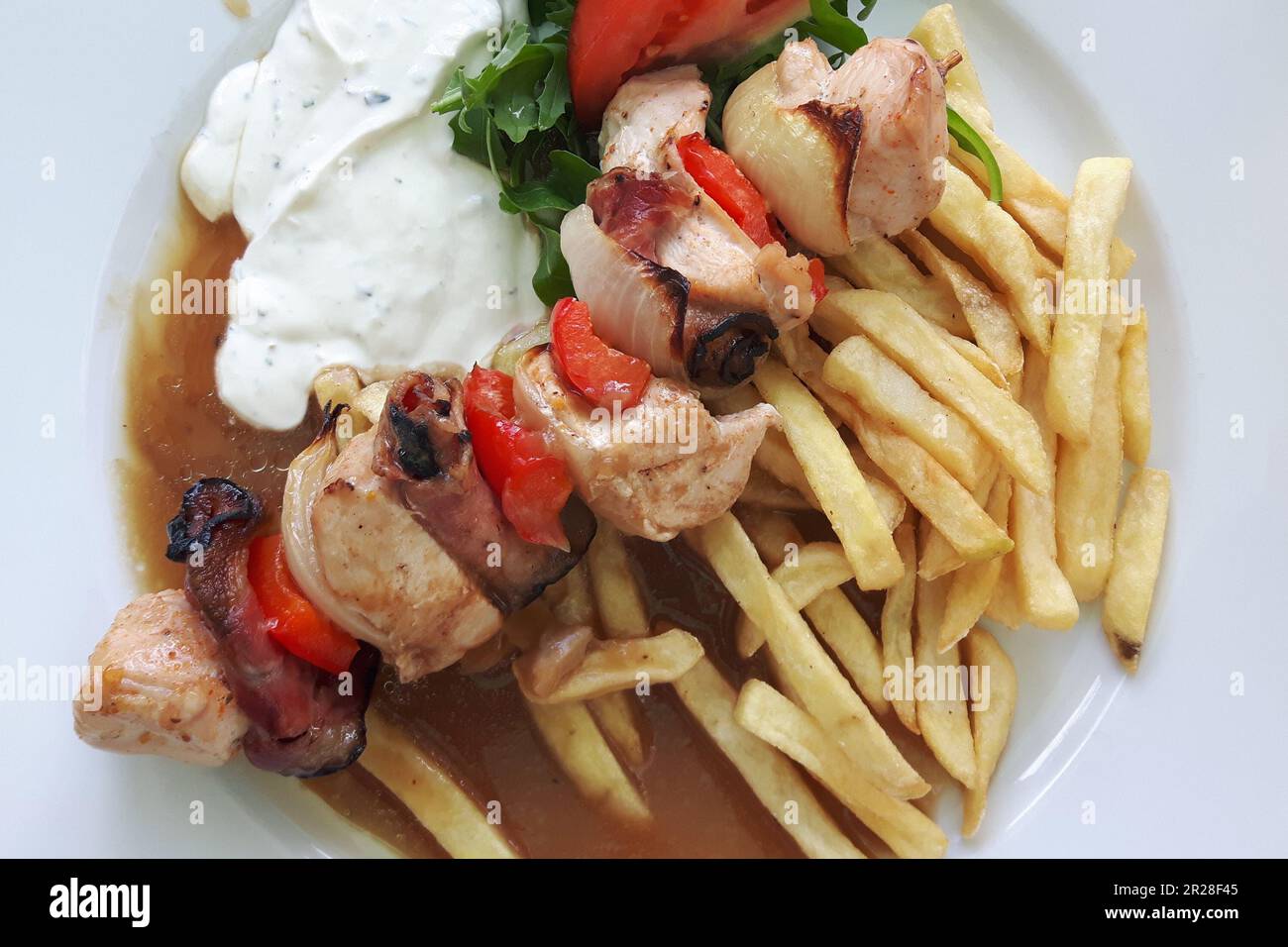skewer and chips as nice food background Stock Photo - Alamy