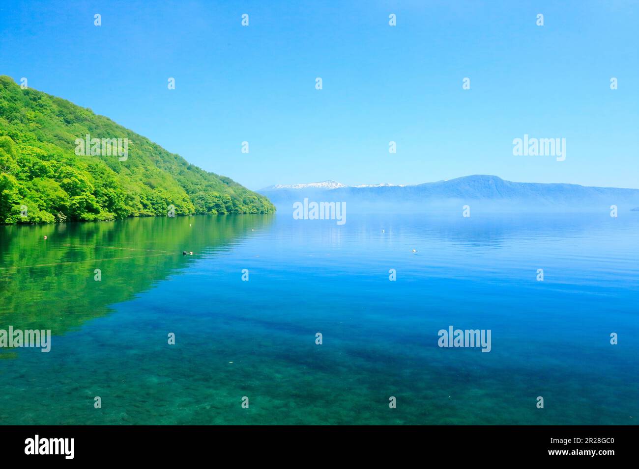 Lake Towada of verdure and Hakkoda mountain Stock Photo - Alamy