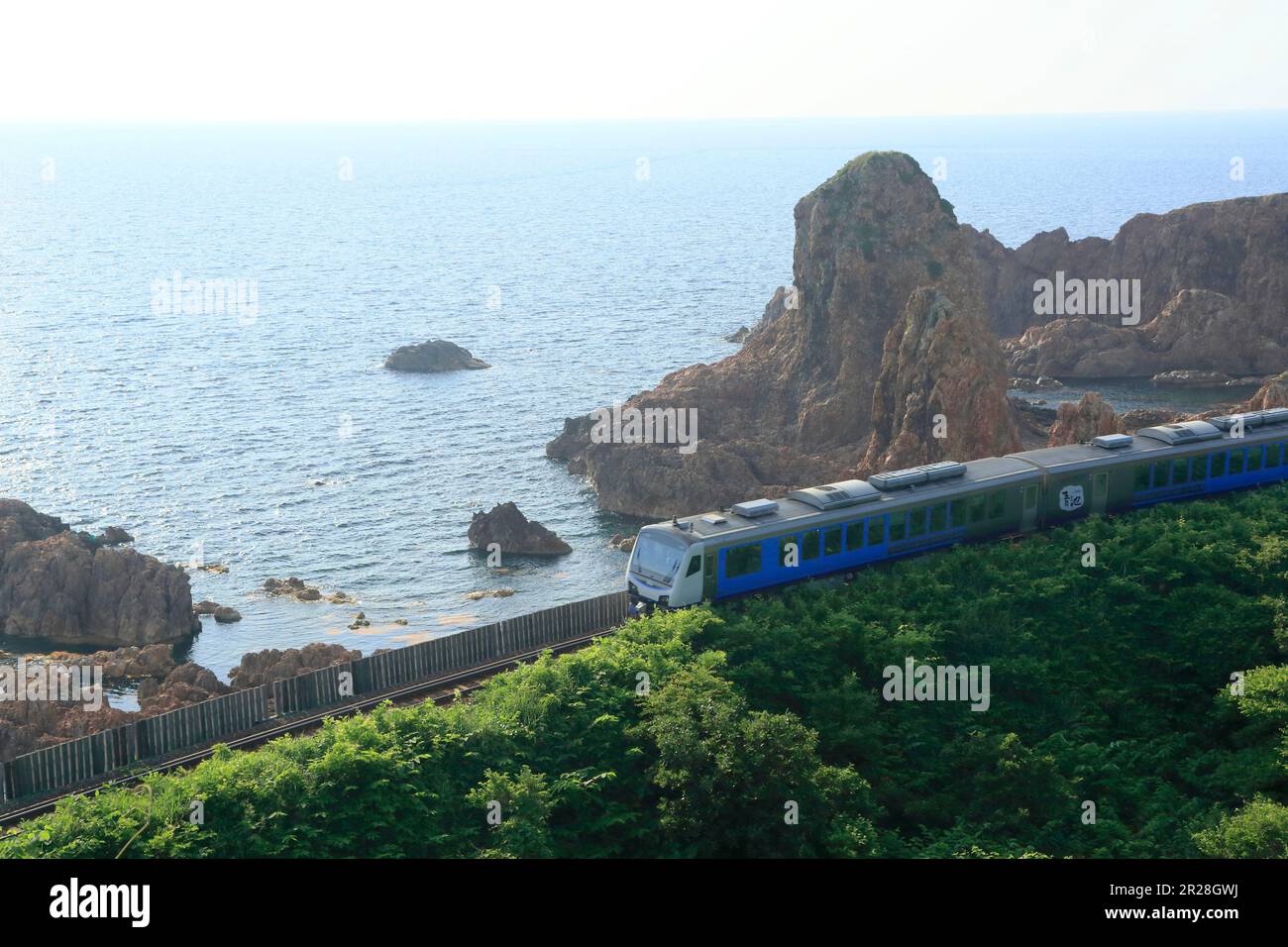 Japan Sea and Gono line train of Resort Shirakami Ao-ike Stock Photo ...