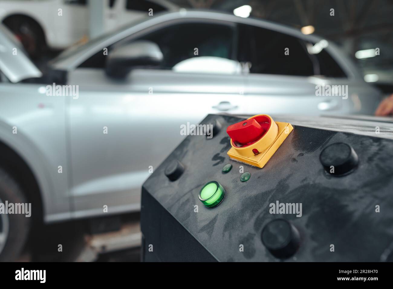 Control panel of a car lift hoist crane in auto service garage Stock ...