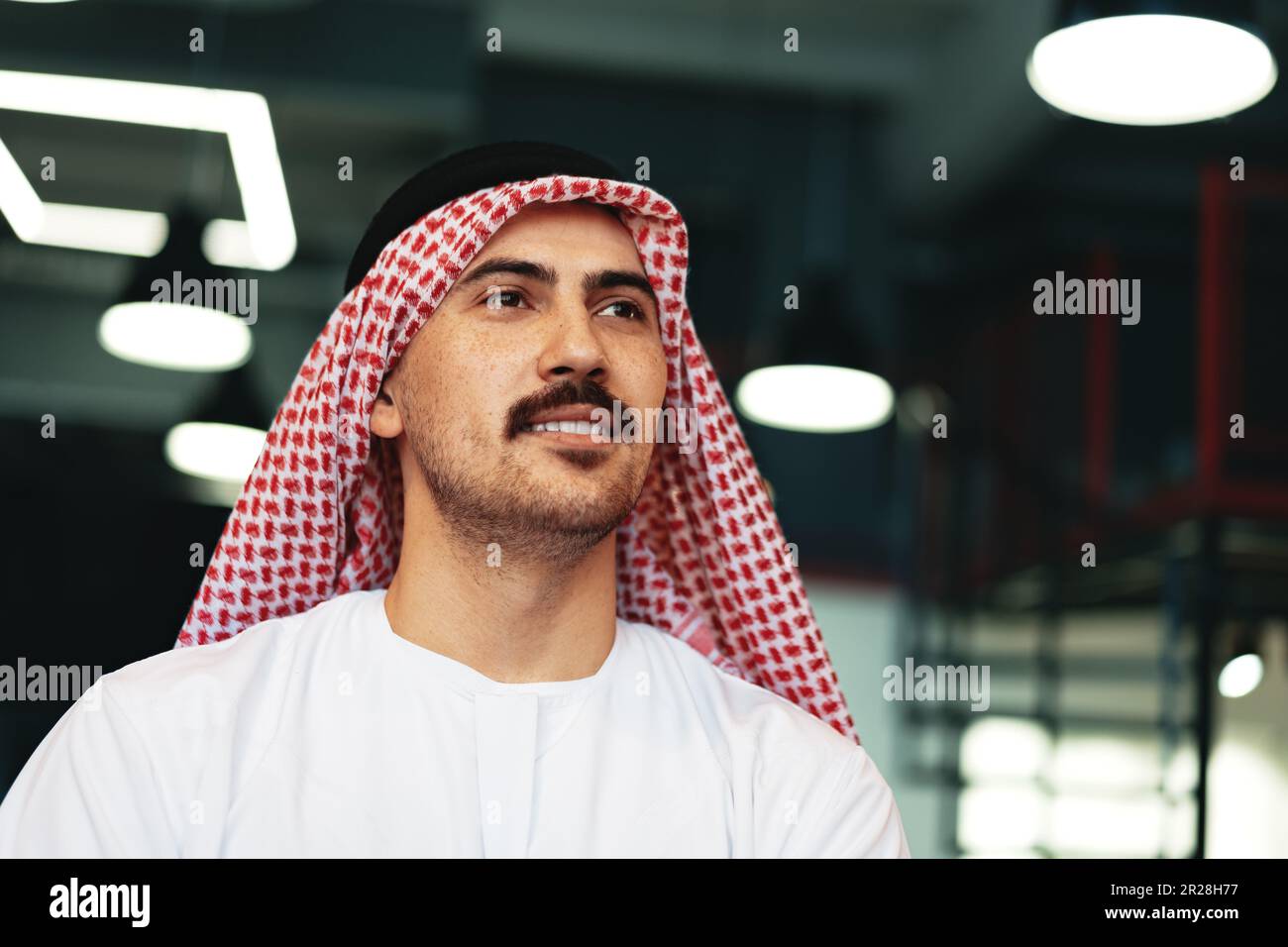 Successful muslim businessmen in traditional outfit in his office Stock ...