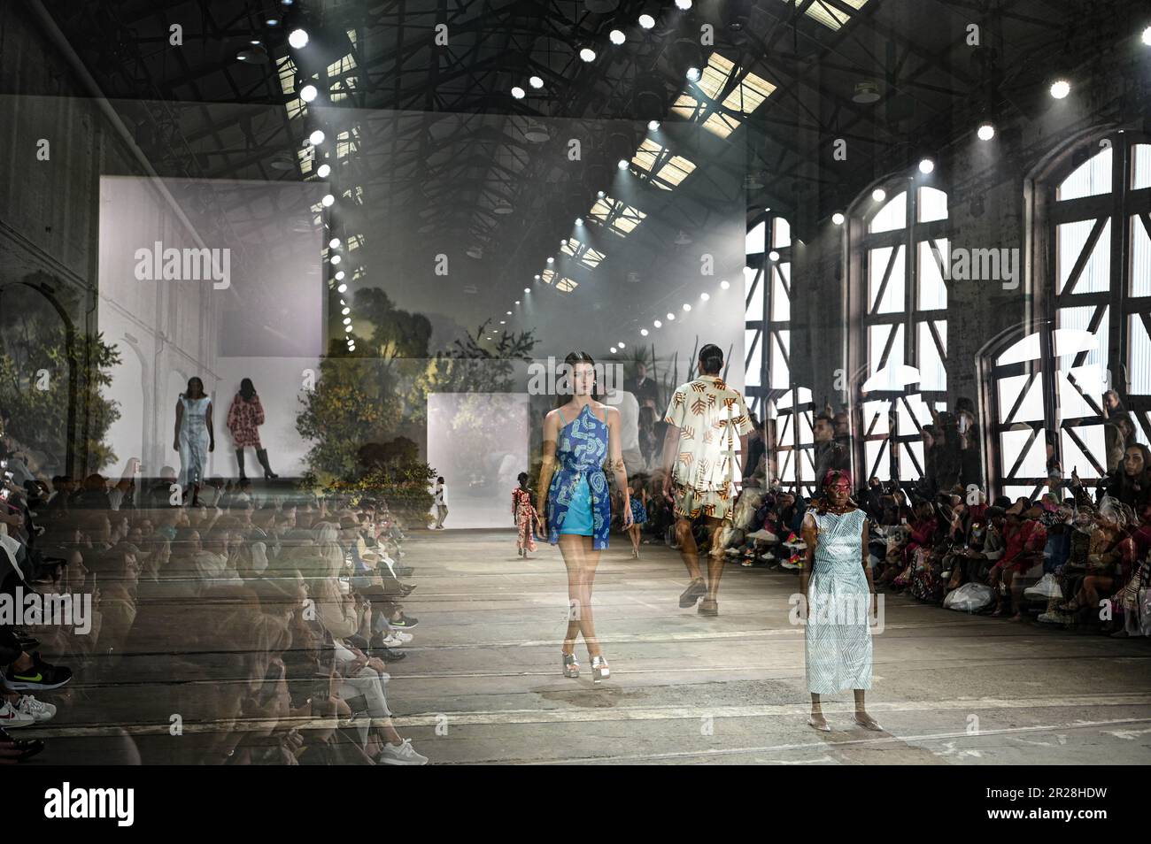 An in-camera multiple exposures of models walking the runway at the ...