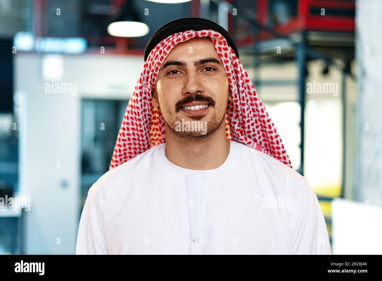 Successful Muslim Businessmen In Traditional Outfit In His Office Stock successful-muslim-businessmen-in-traditional-outfit-in-his-office-stock