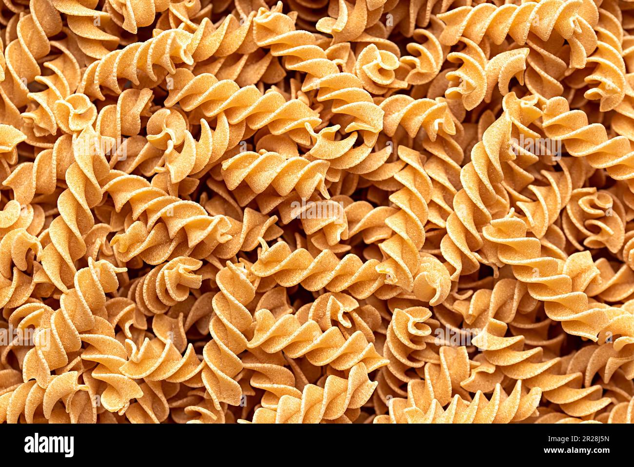 Macro blank photography of raw chickpea pasta, fusilli, macaroni ...
