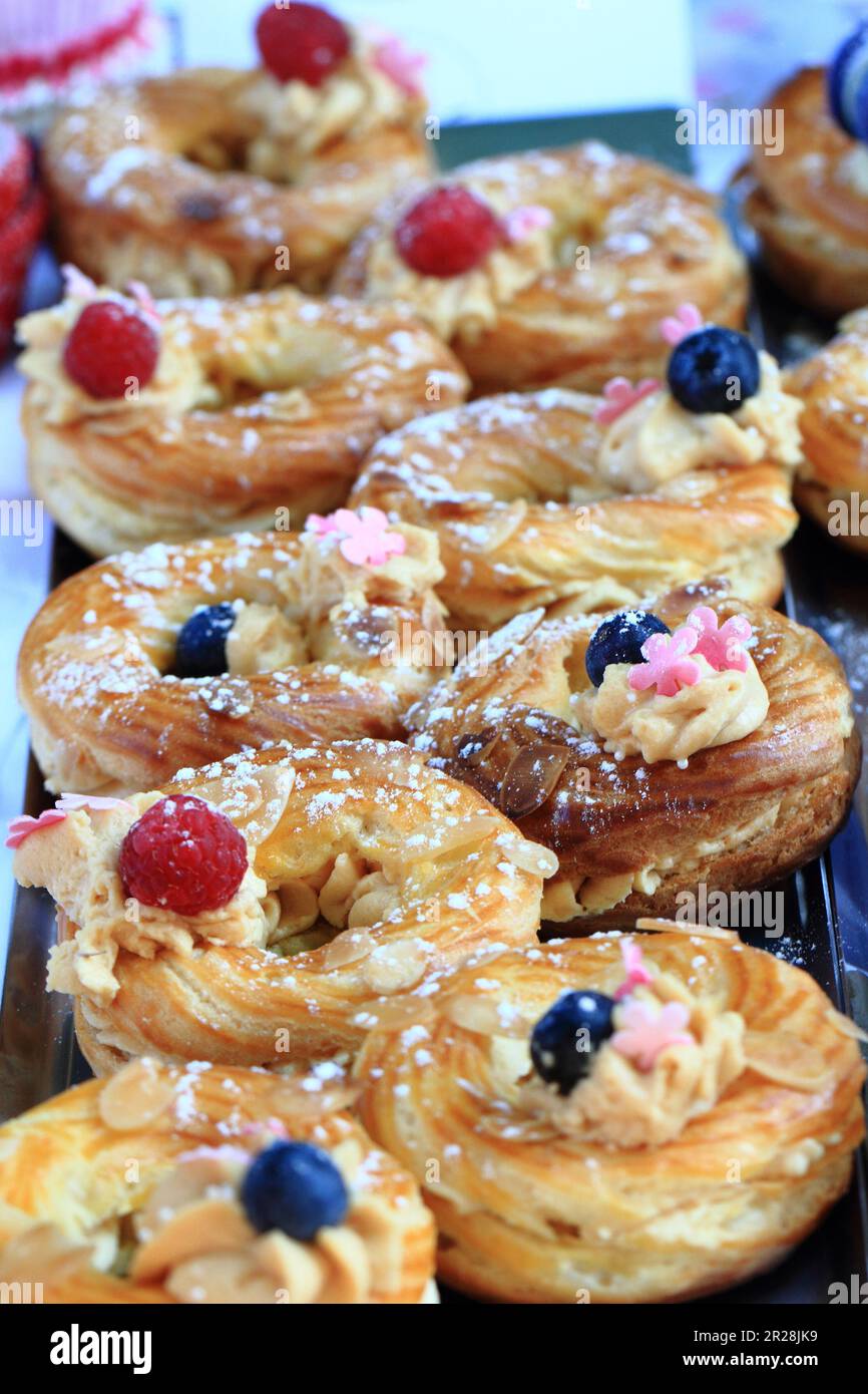 cream puff with raspberries and blueberries as nice gourmet background ...