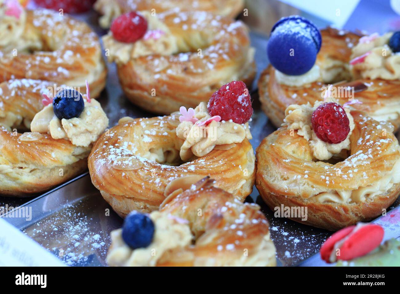 cream puff with raspberries and blueberries as nice gourmet background ...