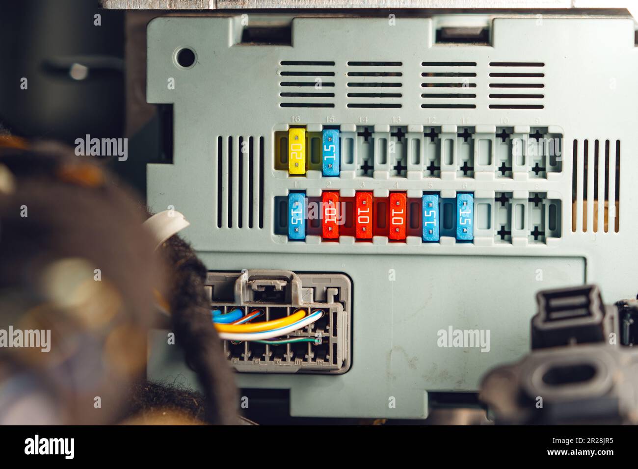 Electric wiring system with colorful wires in the car Stock Photo - Alamy