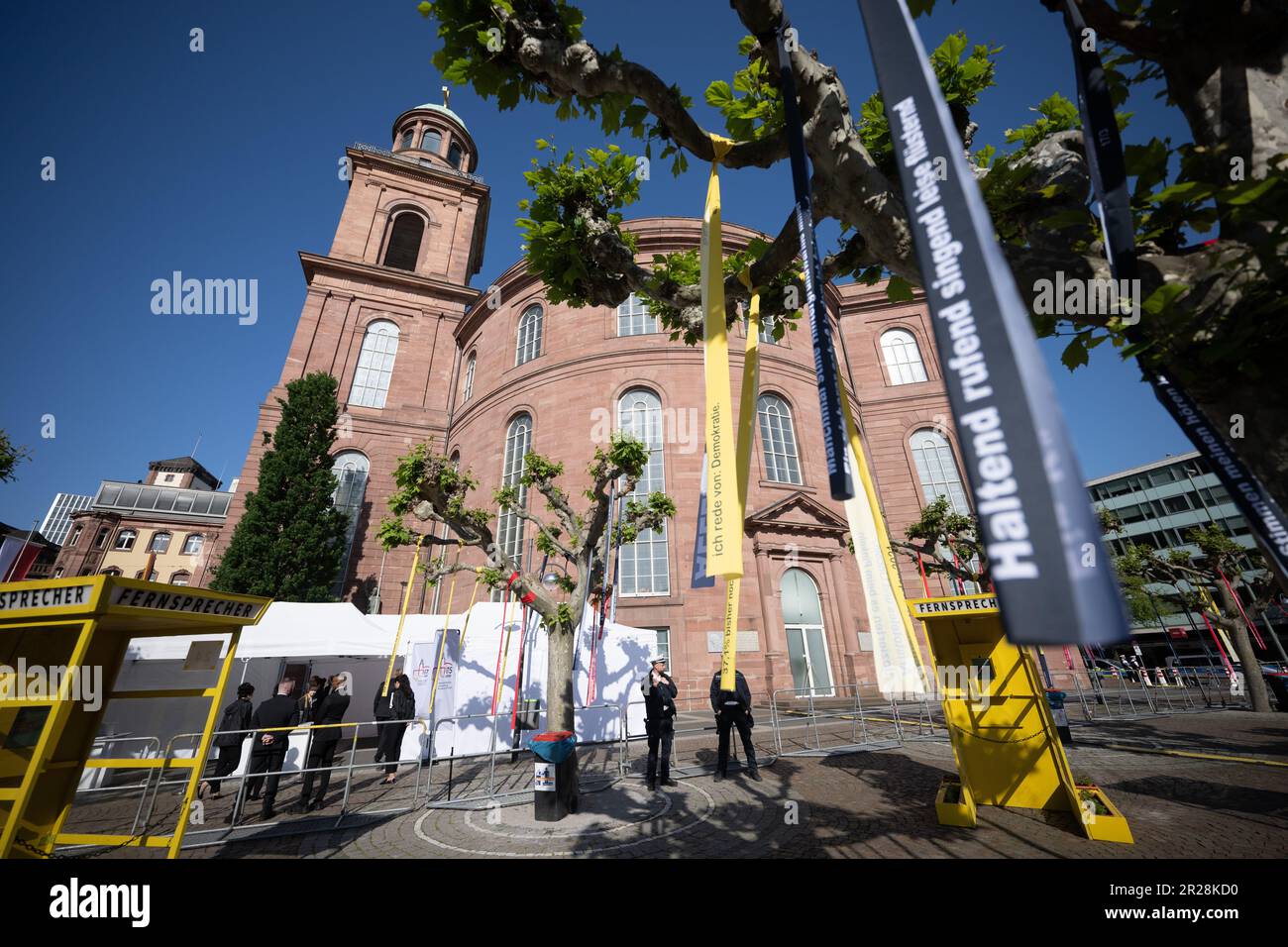 Frankfurt, Germany. 18 May 2023. Ribbons with quotations hang on trees ...