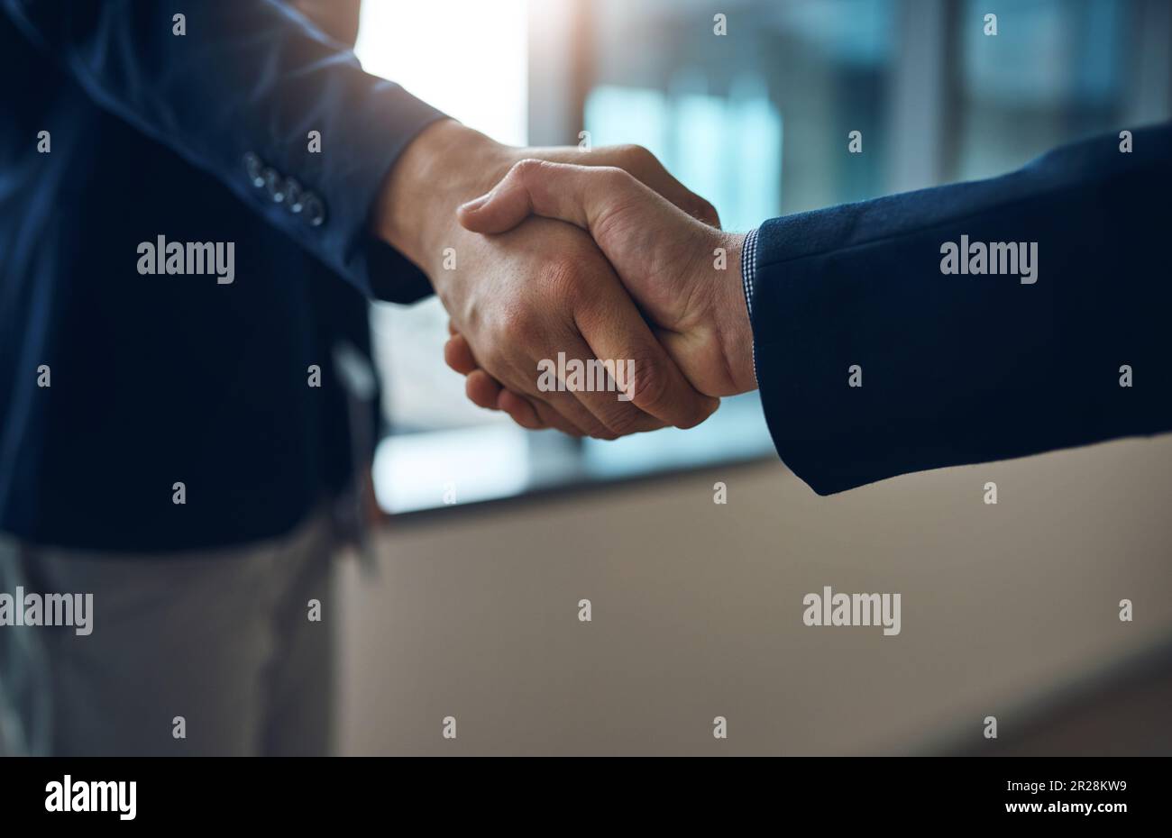 Handshake, welcome and b2b with business men in the office for ...