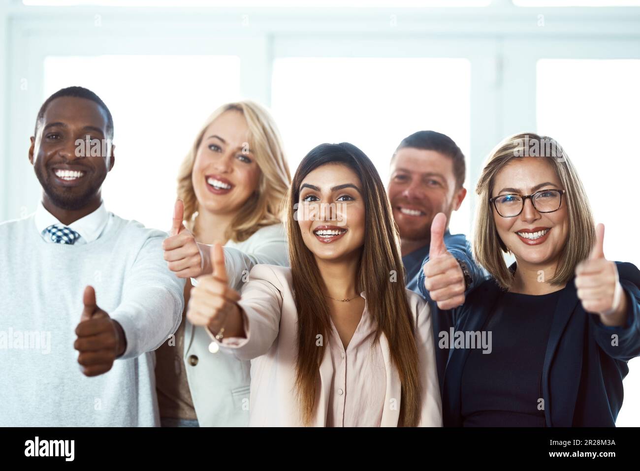 Happy, portrait and group of business people with thumbs up in office ...