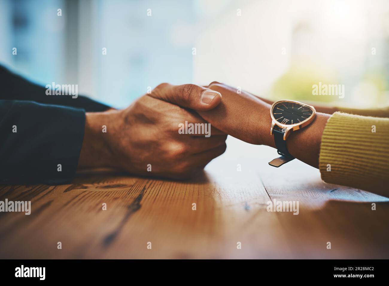 Closeup, holding hands and couple with empathy, support and solidarity ...