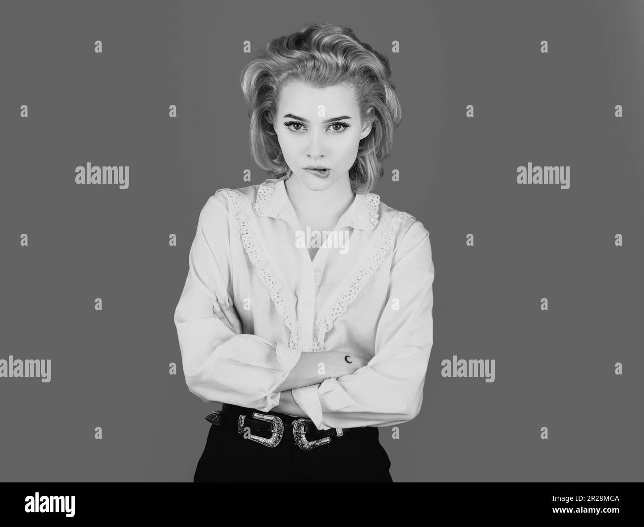 Redhead woman. Fashion female model isolated on blue. Young beautiful ...