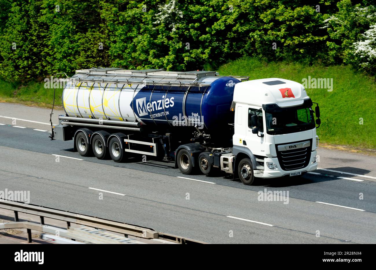 Menzies Distribution tanker lorry on the M40 motorway, Warwickshire, UK ...