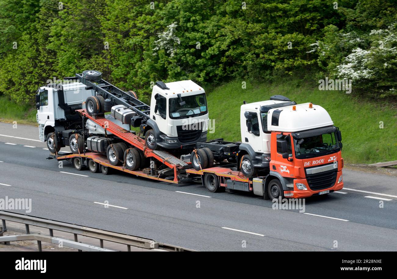 De Rooy transporter lorry carrying new lorries on the M40 motorway ...