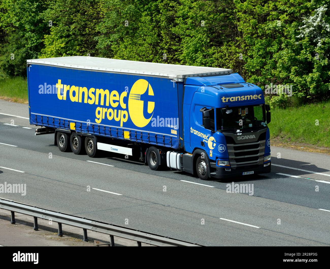 Transmec Group lorry on the M40 motorway, Warwickshire, UK Stock Photo ...