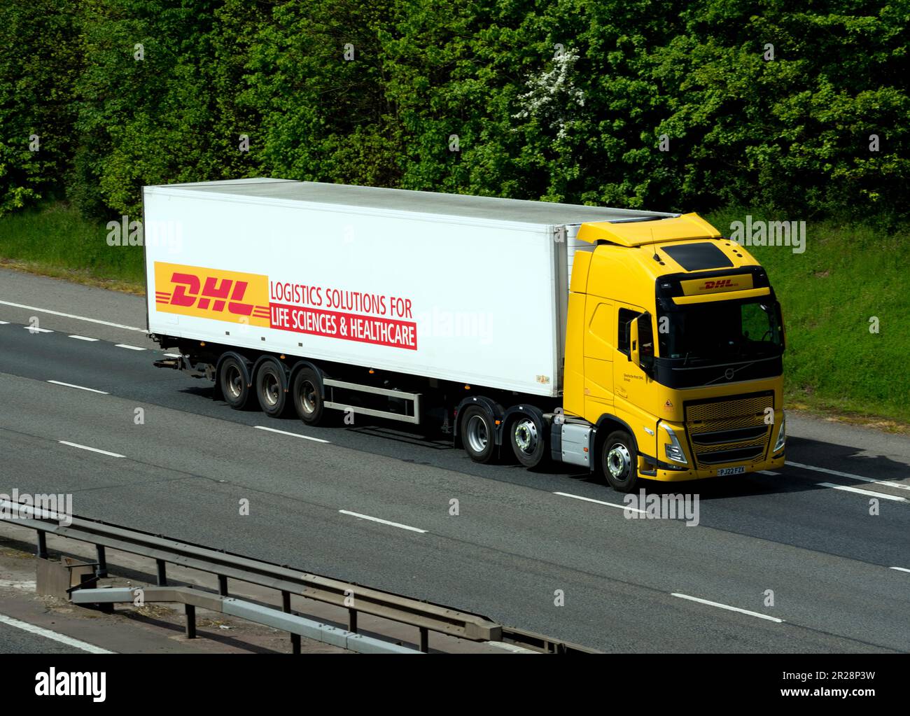 DHL lorry on the M40 motorway, Warwickshire, UK Stock Photo - Alamy