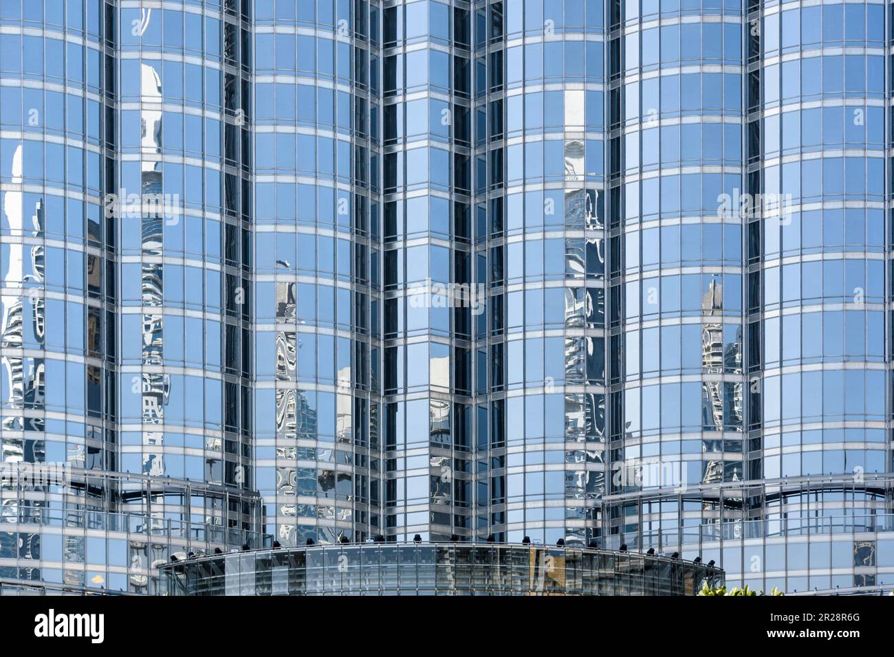 Reflections of nearby skyscrapers on the windows of the Burj Khalifa ...