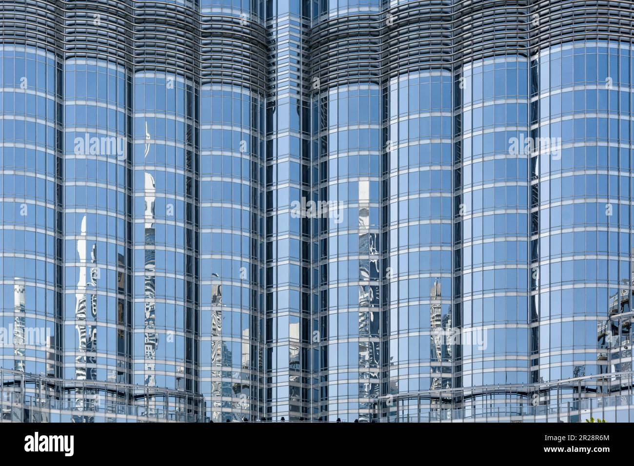 Reflections of nearby skyscrapers on the windows of the Burj Khalifa ...