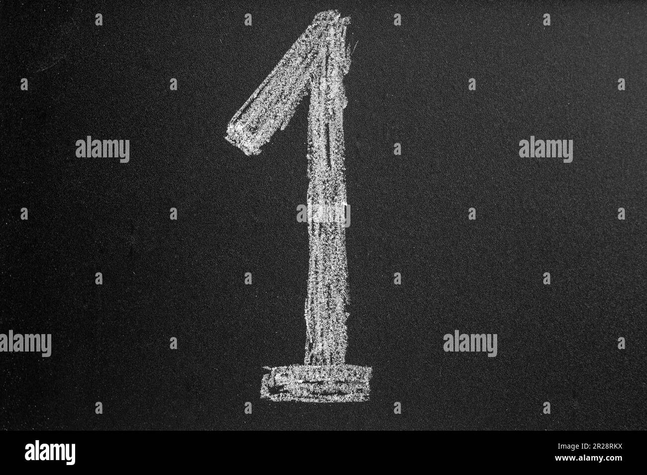 Number one handwritten with chalk on a black blackboard Stock Photo - Alamy