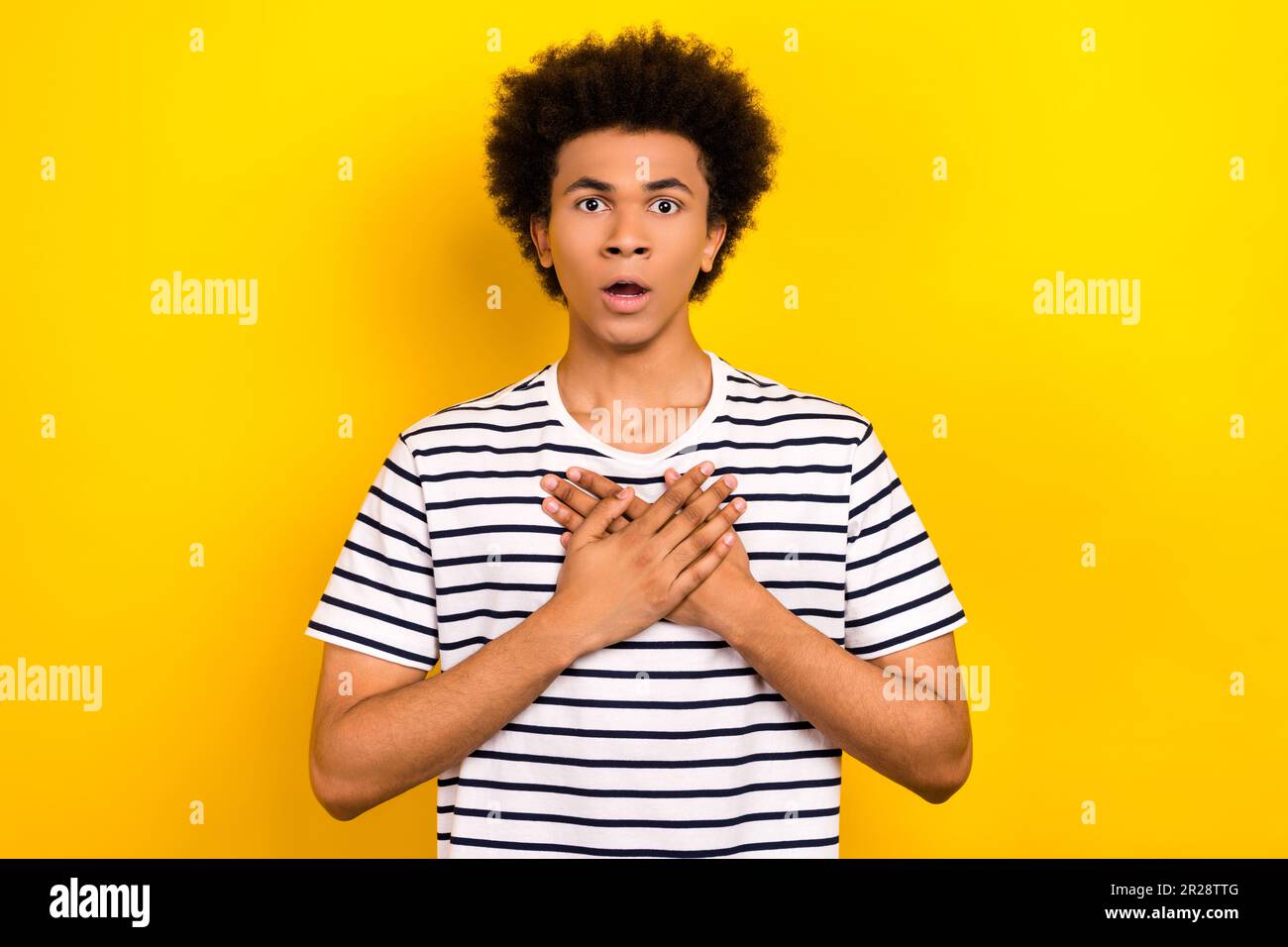 Portrait photo of youth funny scared man hands heart confused ...