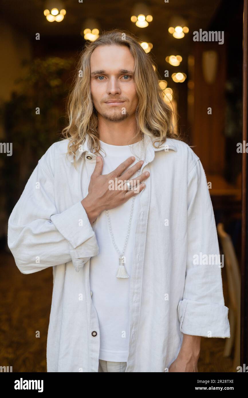 Man touching clothes outside hi-res stock photography and images - Alamy